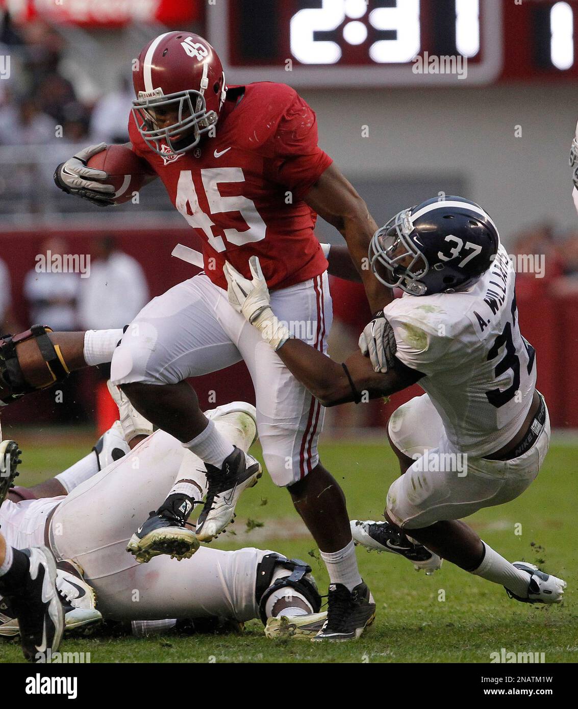 Alabama running back Jalston Fowler (45) is stopped by Georgia Southern ...