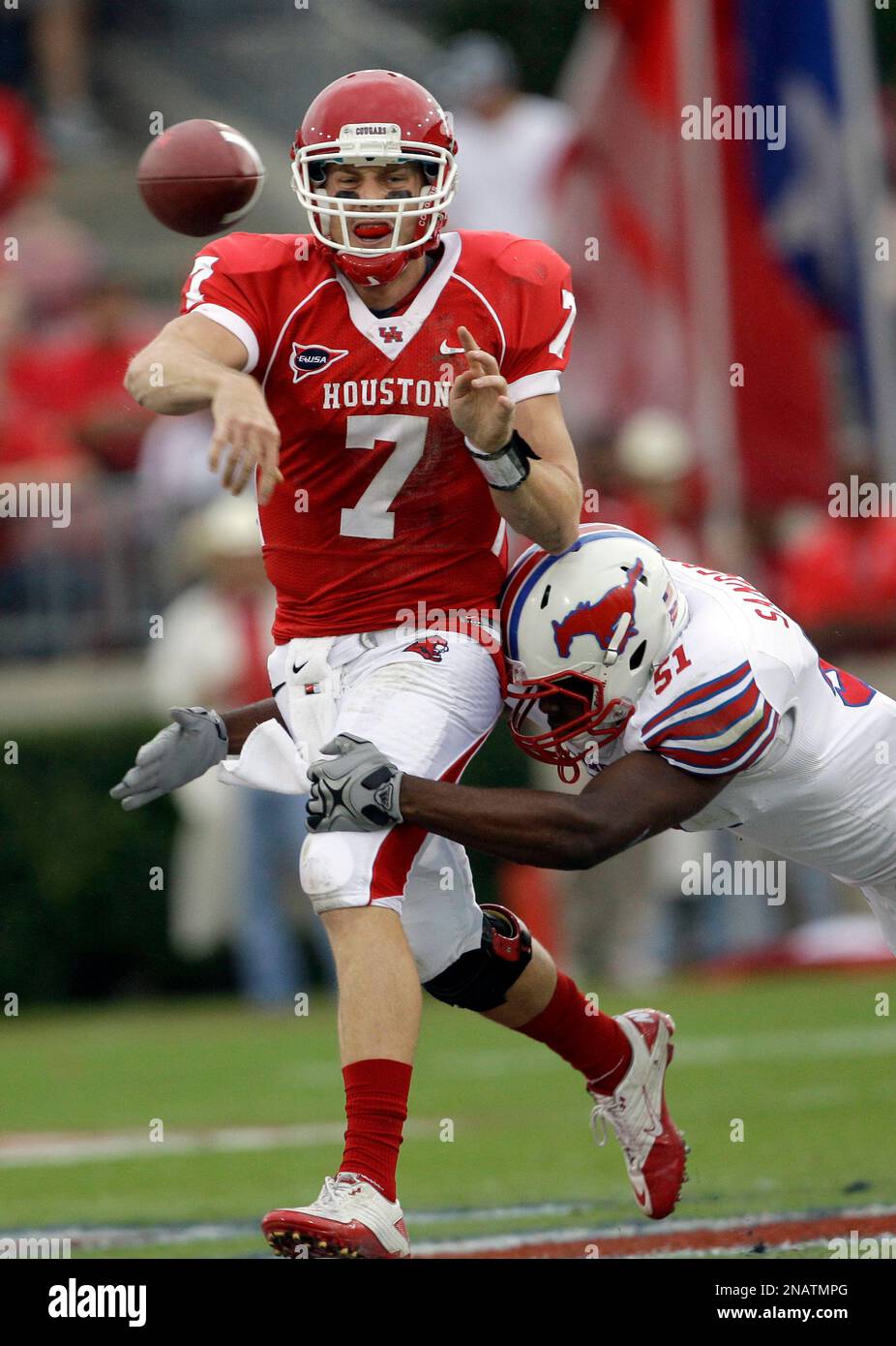 Houston quarterback Case Keenum (7) throws a pass as SMU defensive ...