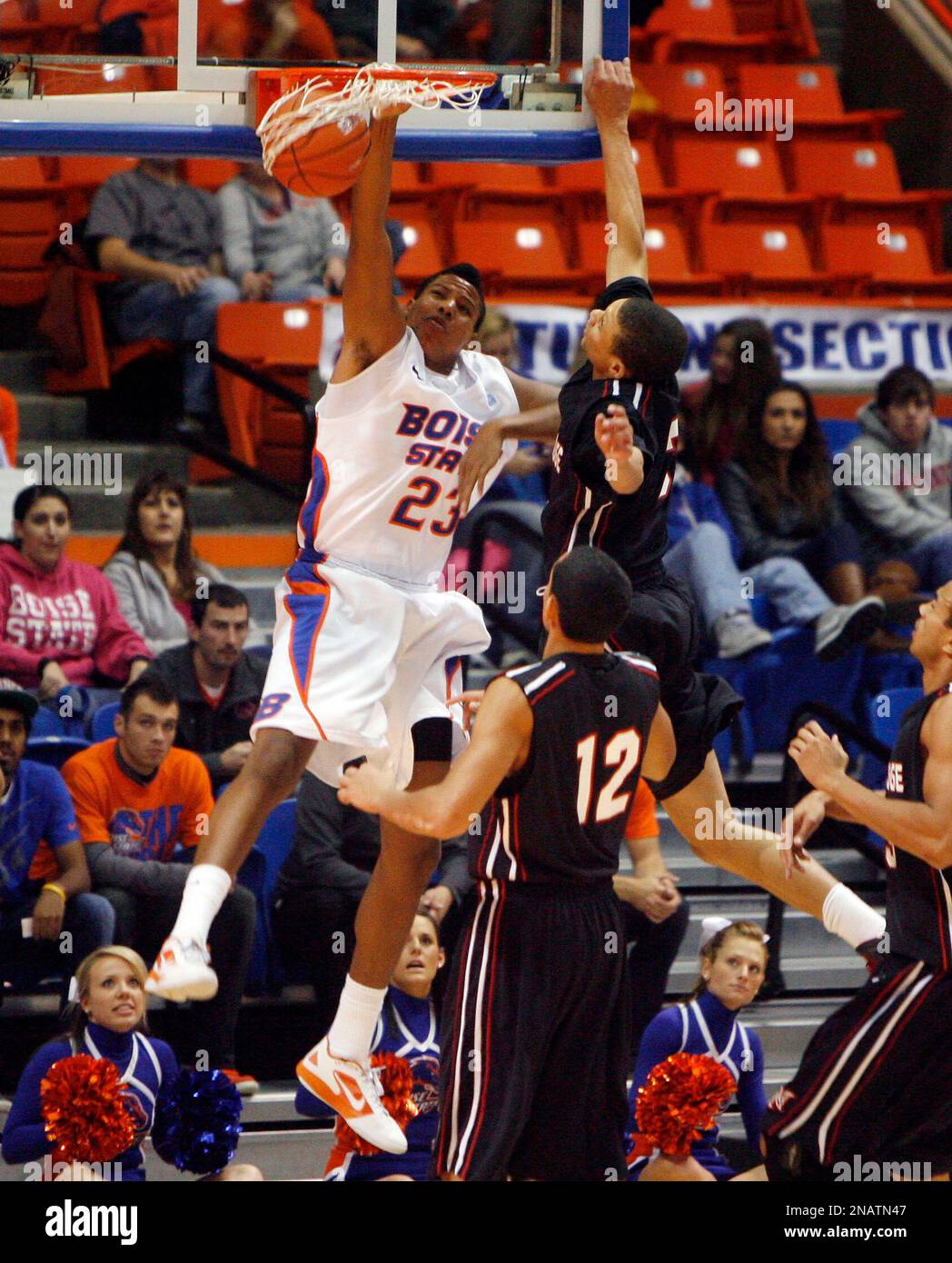 Boise State's Ryan Watkins dunks against Cal State Northridge's Stephan ...