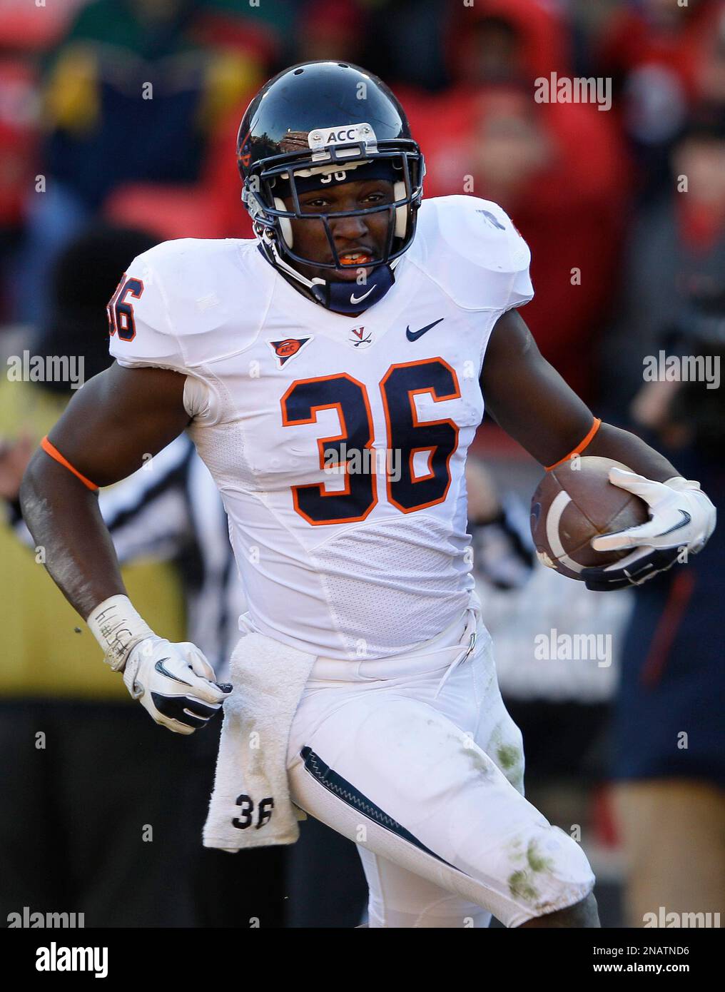 Virginia's Max Milien runs the ball in the second half of an NCAA ...