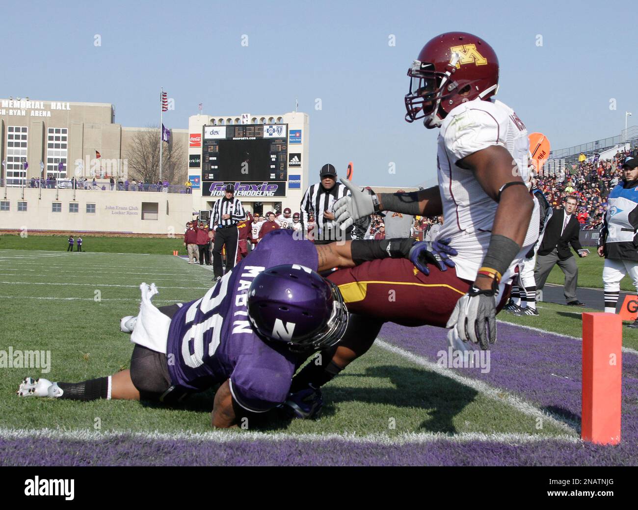 Northwestern cornerback Jordan Mabin (26) breaks up a pass intended for ...