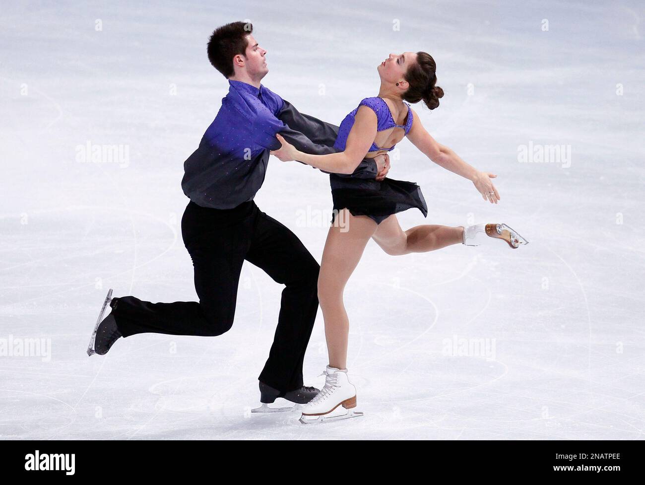 Jessica Dube, right, and Sebastien Wolfe of Canada perform their Pairs ...