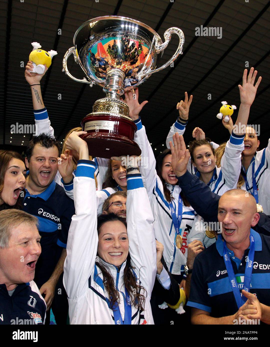 Italy's volleyball national team members celebrate after the awarding ...