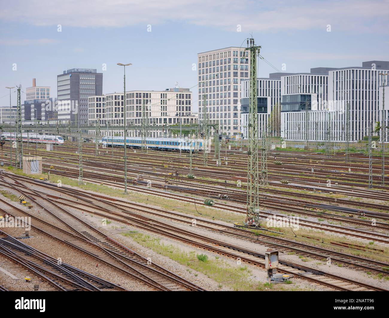 Munich, Germany - August 4, 2022 : Train line crossing near central ...