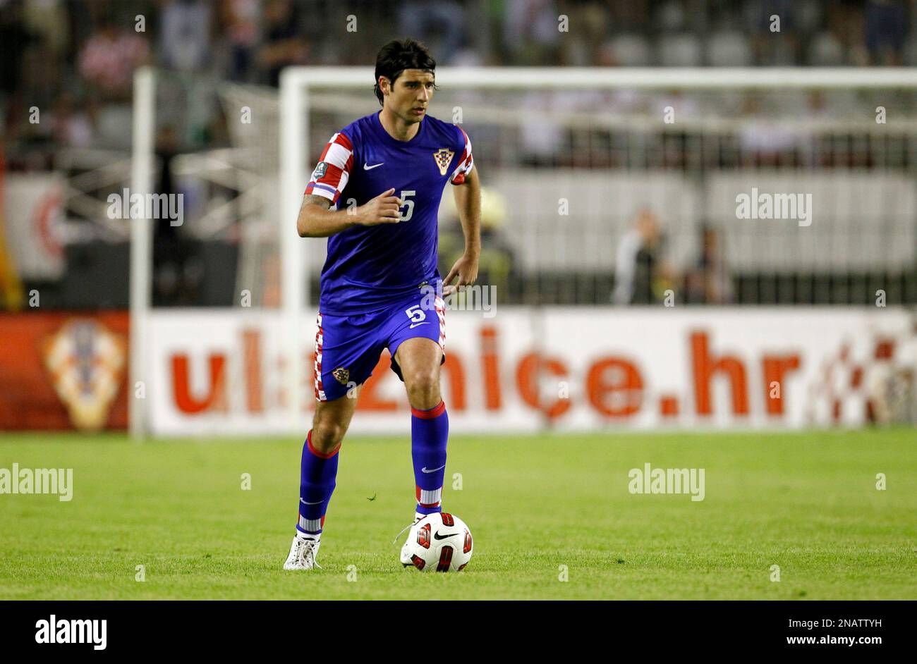 Croatia's Vedran Corluka goes for the ball during their Euro 2012 group ...