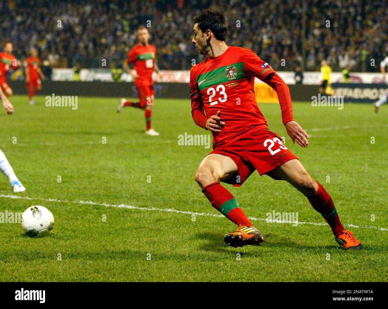 Portugal's Helder Postiga goes for the ball during their Euro 2012 ...