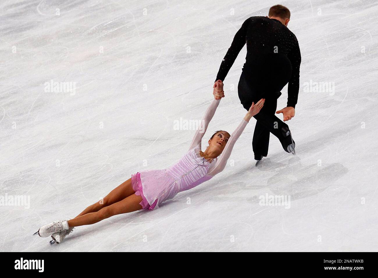 Vera Bazarova and Yuri Larionov of Russia perform their Pairs short program during the Ice ...