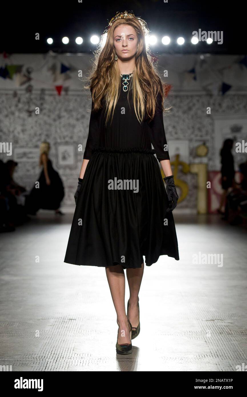 A model presents an outfit by Danish designer Peter Jensen at the ...
