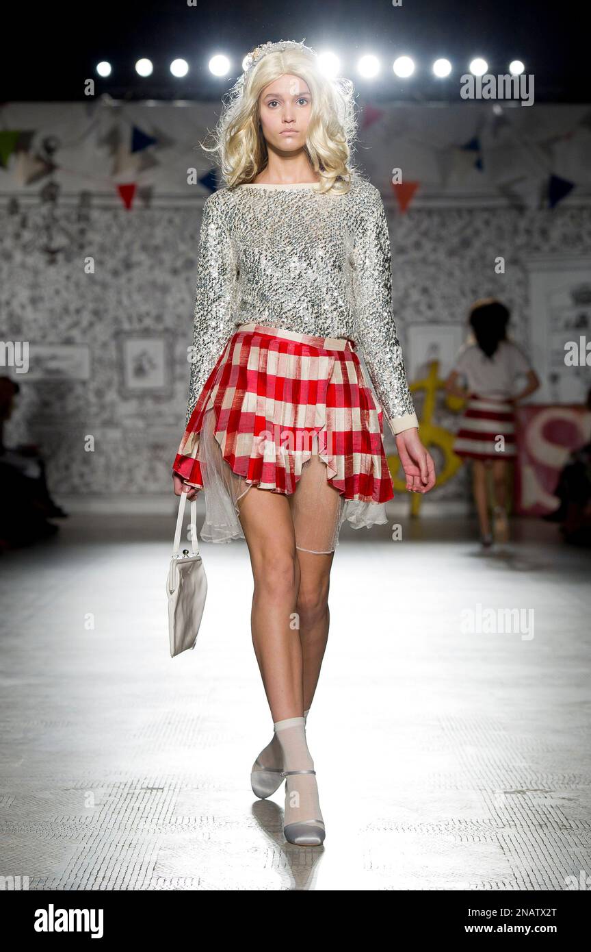 A model wears an outfit by Danish designer Peter Jensen at the Victoria ...