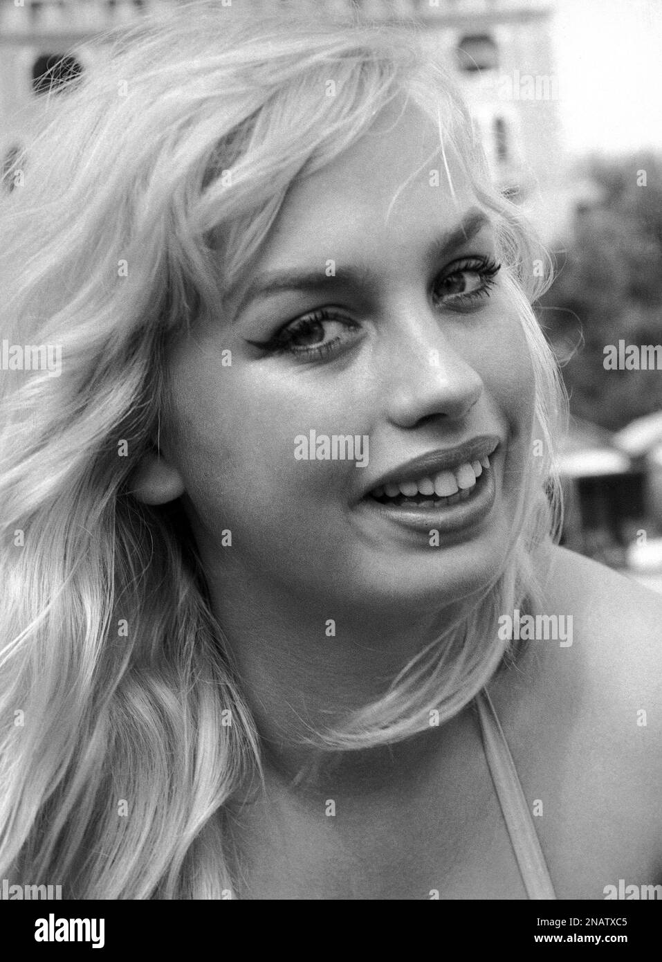 Portrait of Austrian actress Barbara Valentin taken on the beach of the Excelsior Hotel at the ...