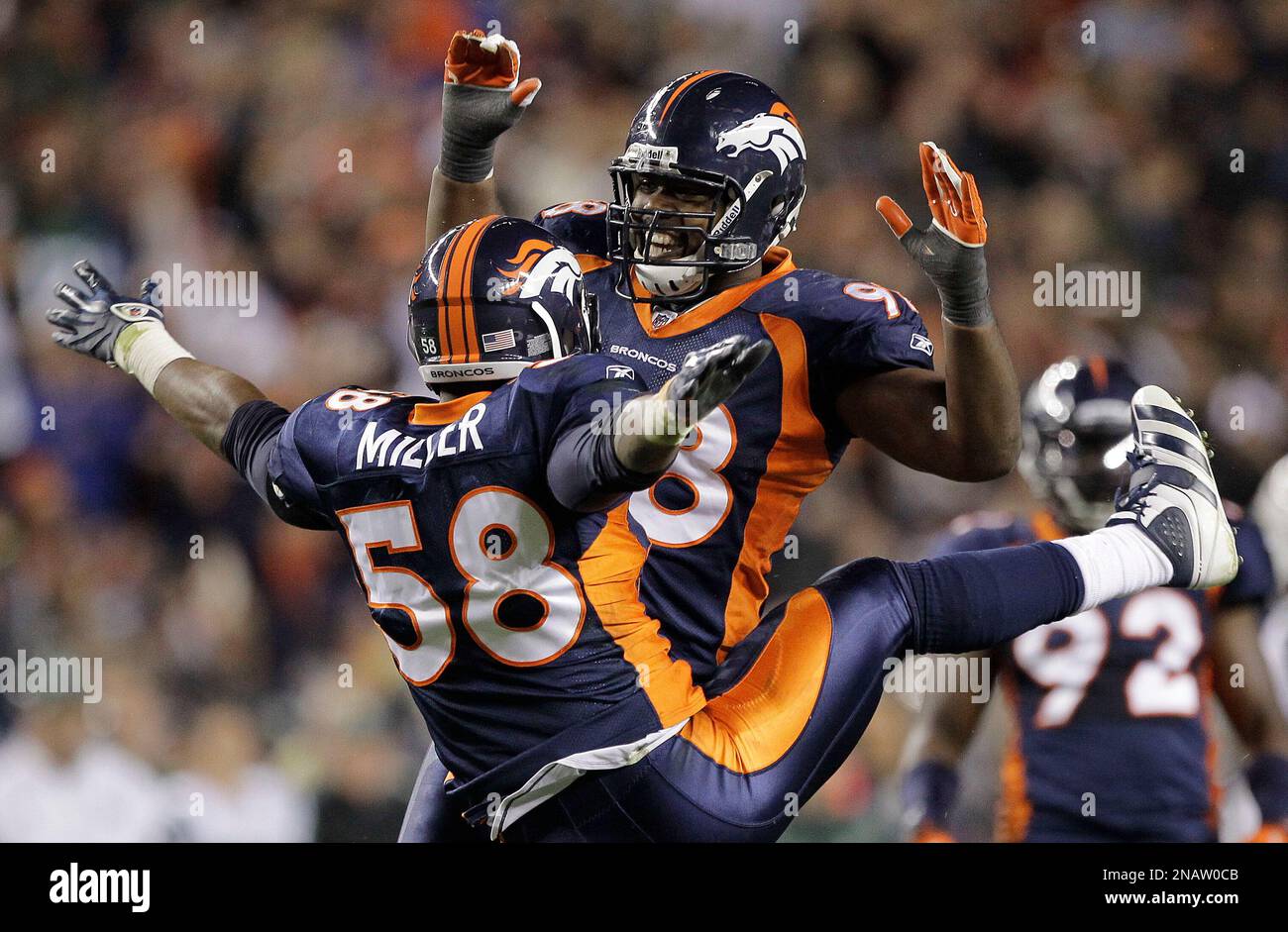 Denver Broncos outside linebacker Von Miller (58) and defensive end ...