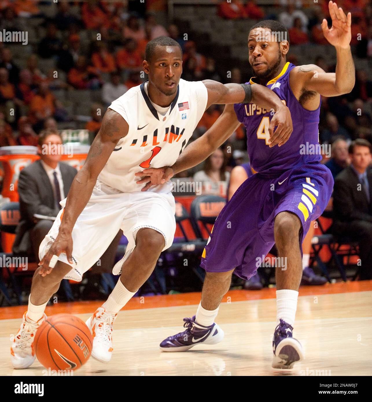 Illinois guard D.J. Richardson (1) drives for the basket past Lipscomb ...
