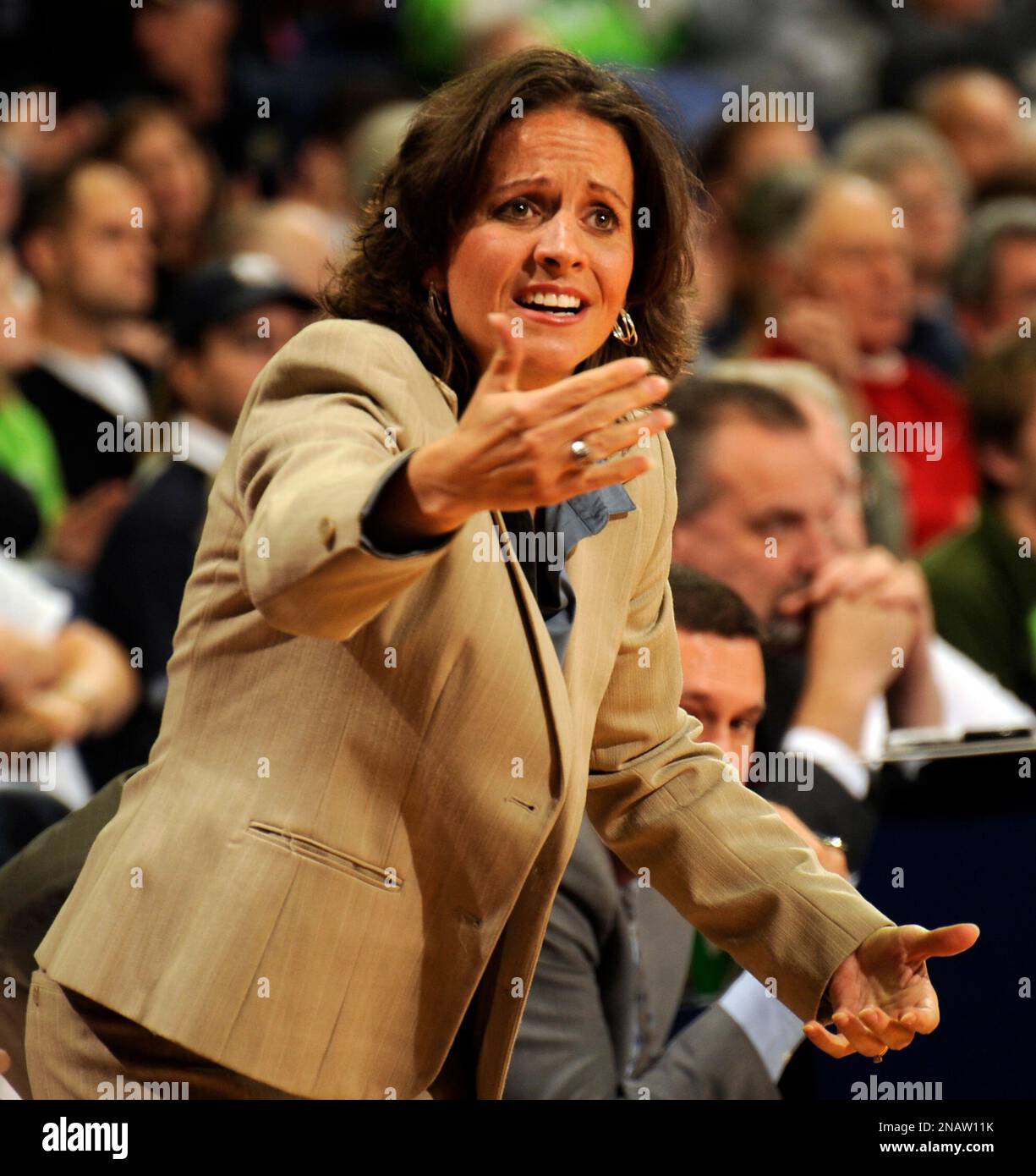 Hartford coach Jennifer Rizzotti directs her players in the first half ...