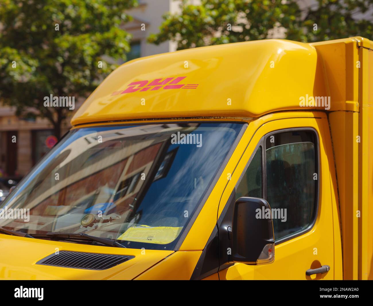 Munich, Germany - August 5, 2022 : yellow DHL courier service delivery ...
