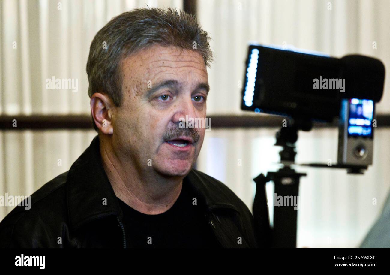 Los Angeles Dodgers general manager Ned Colletti is interviewed before ...