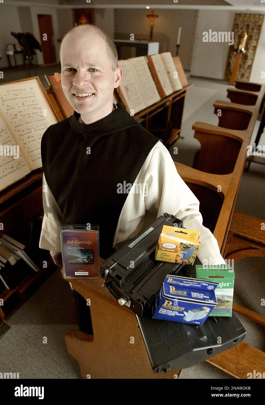 FILE - In this Feb. 2, 2004 file photo, Rev. Bernard McCoy shows off ...