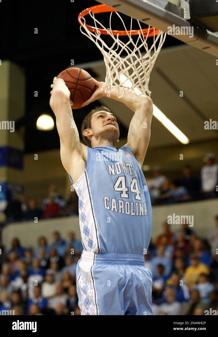 North Carolina center Tyler Zeller dunks against UNC Asheville in an NCAA college basketball ...