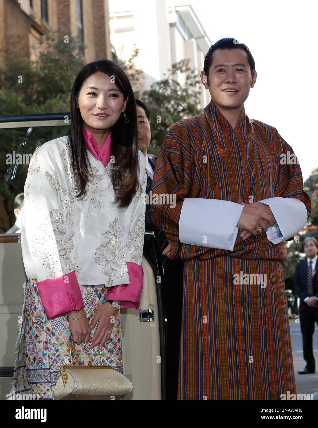Bhutan's King Jigme Khesar Namgyal Wangchuck, right, and Queen Jetsun Pema are greeted by Keio ...