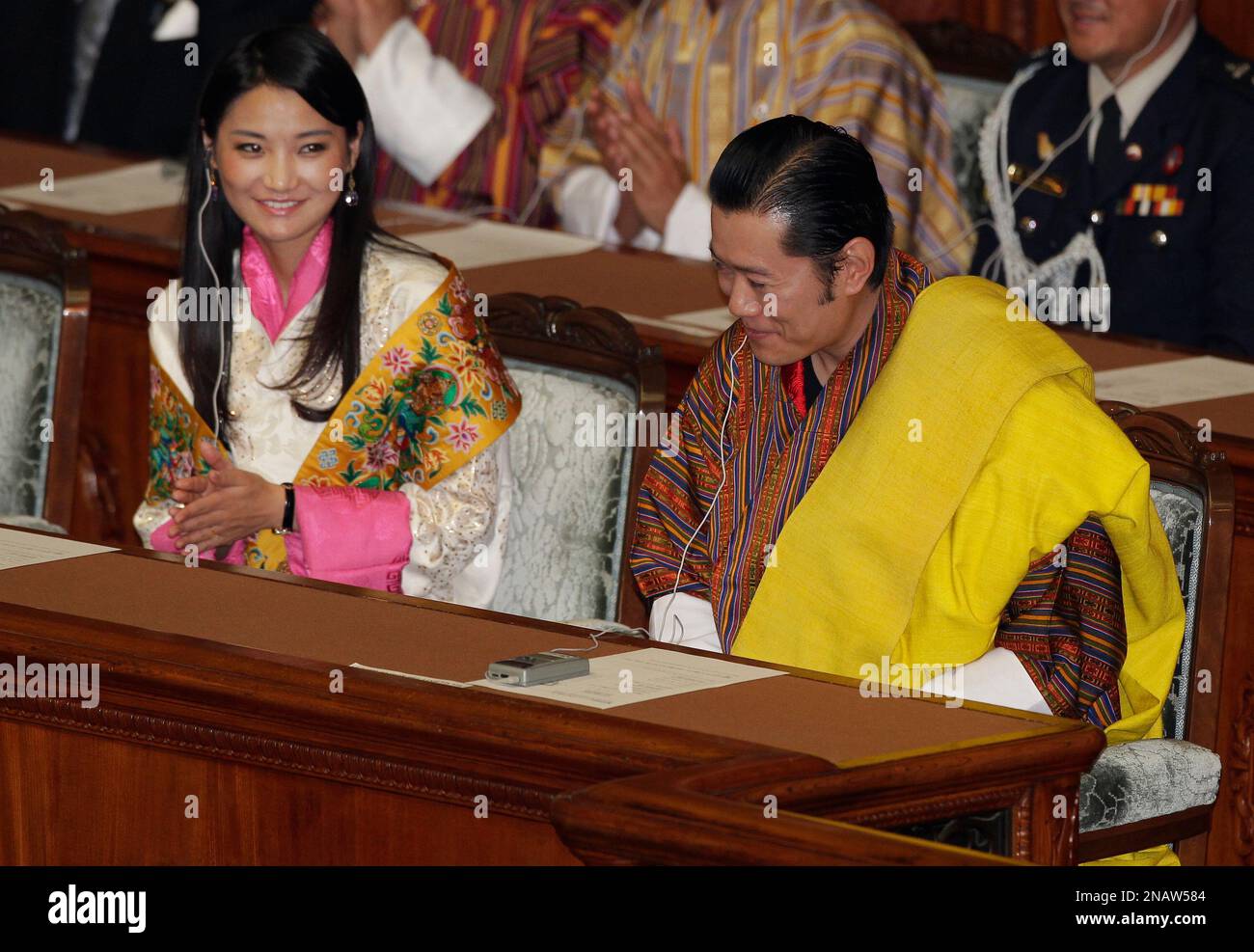 Bhutan's King Jigme Khesar Namgyal Wangchuck, right, and Queen Jetsun Pema share a smile at the ...