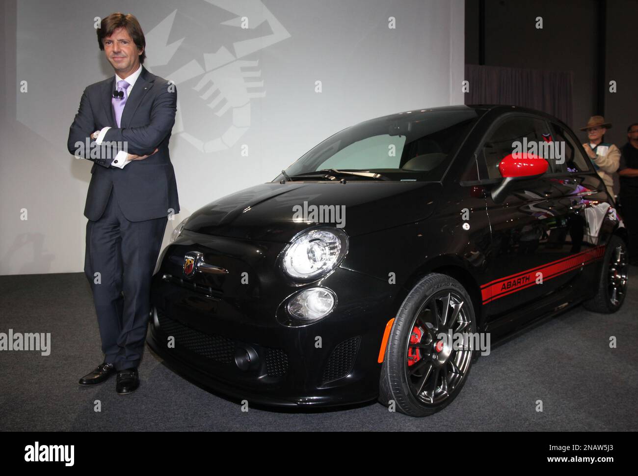 CEO of the Fiat brand Olivier Francois poses with the Fiat 500 Abarth ...