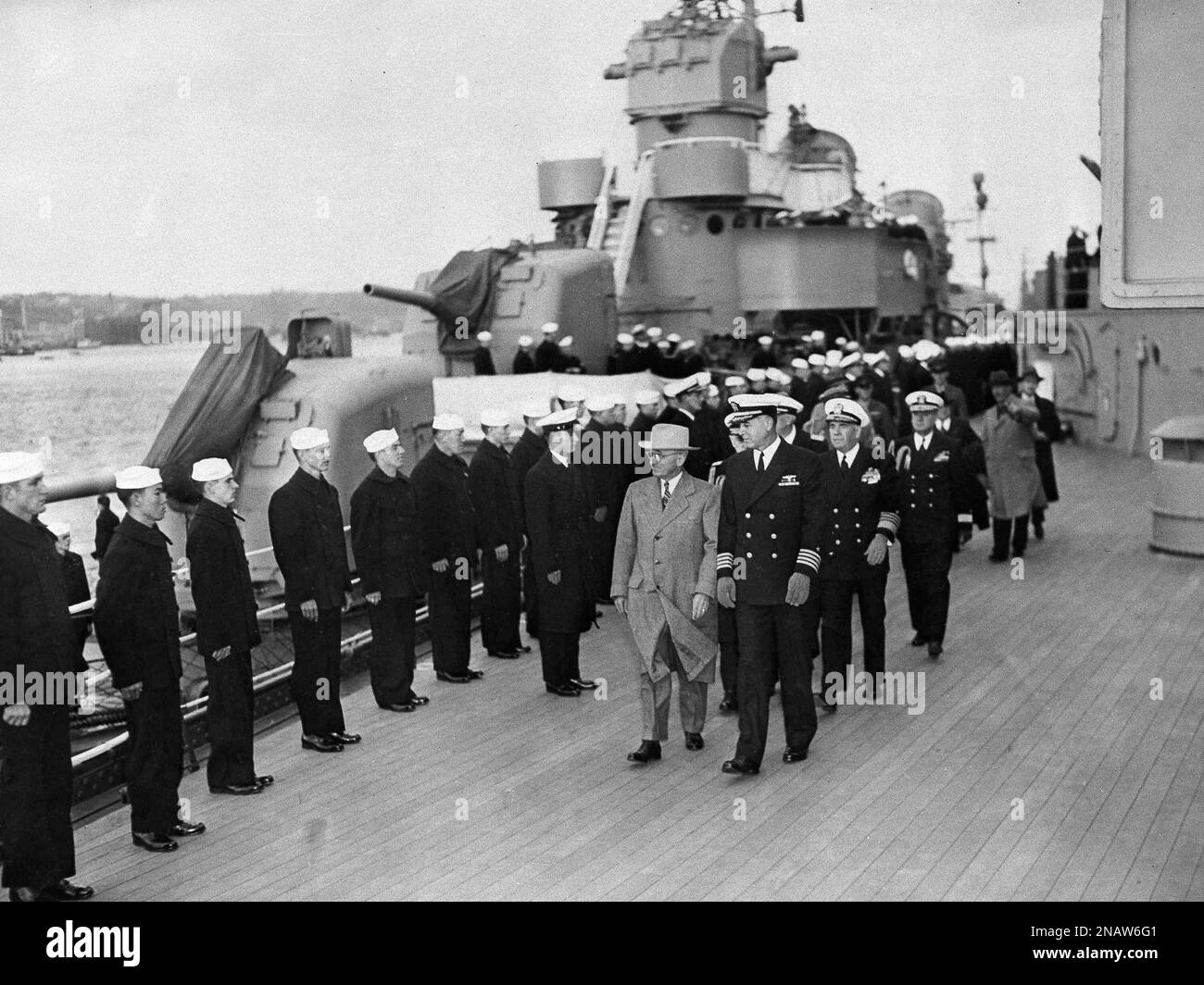 Sailors from Missouri stand stiffly at attention aboard the battleship ...