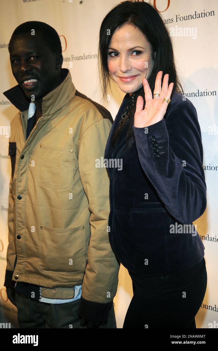 Okello Kelo Sam and Mary Louise Parker attend the Orphans Foundation's ...