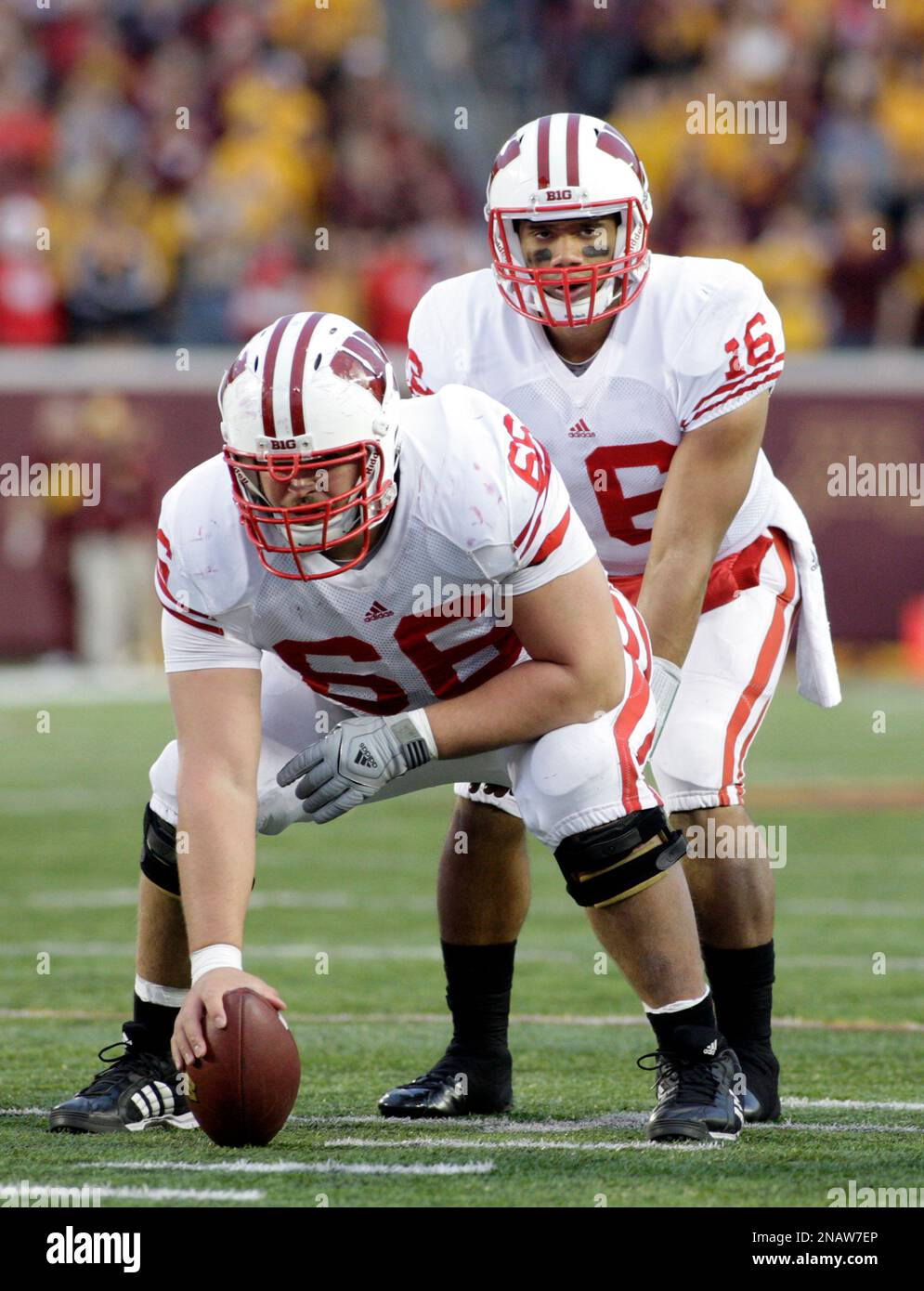 Wisconsin quarterback Russell Wilson (16) plays along with Wisconsin ...