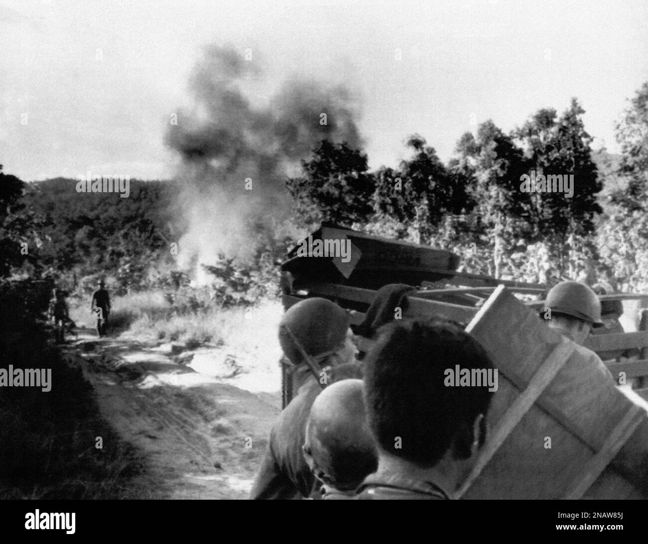 Trucks of a convoy attacked by Communist forces near Cheo Reo in South ...