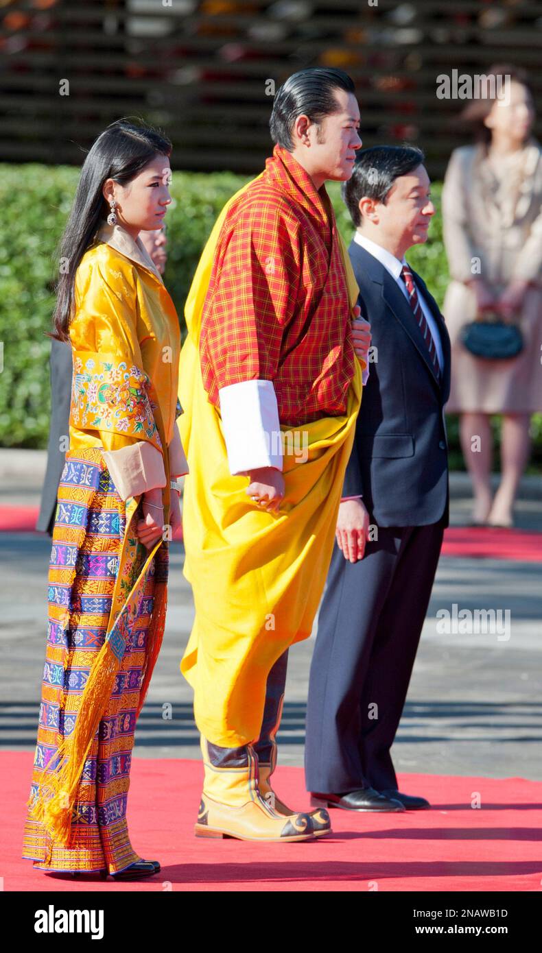 Bhutan's King Jigme Khesar Namgyal Wangchuck, center, Queen Jetsun Pema Wangchuck are attended ...
