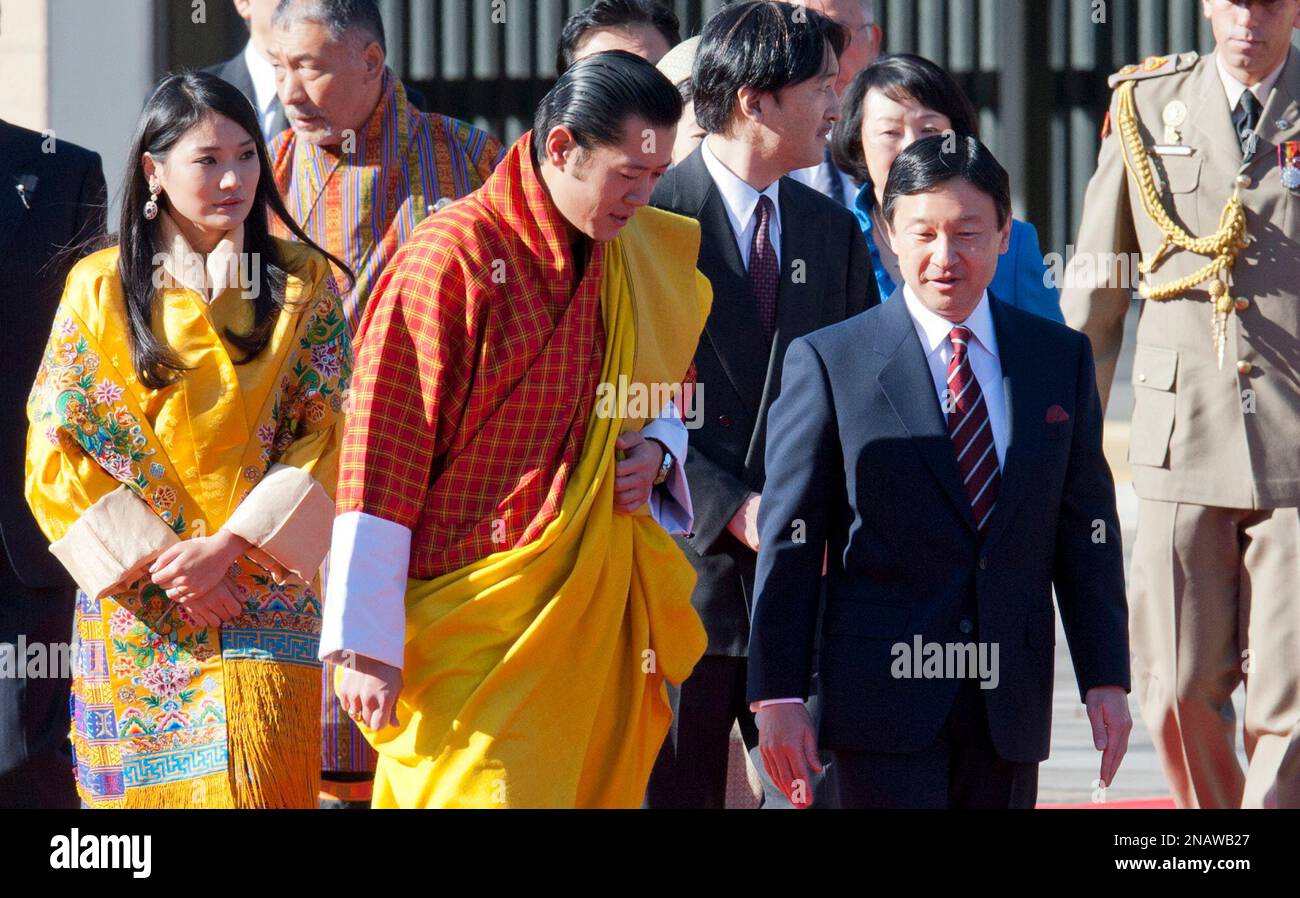 Bhutan's King Jigme Khesar Namgyal Wangchuck, center, and Queen Jetsun Pema are attended by ...