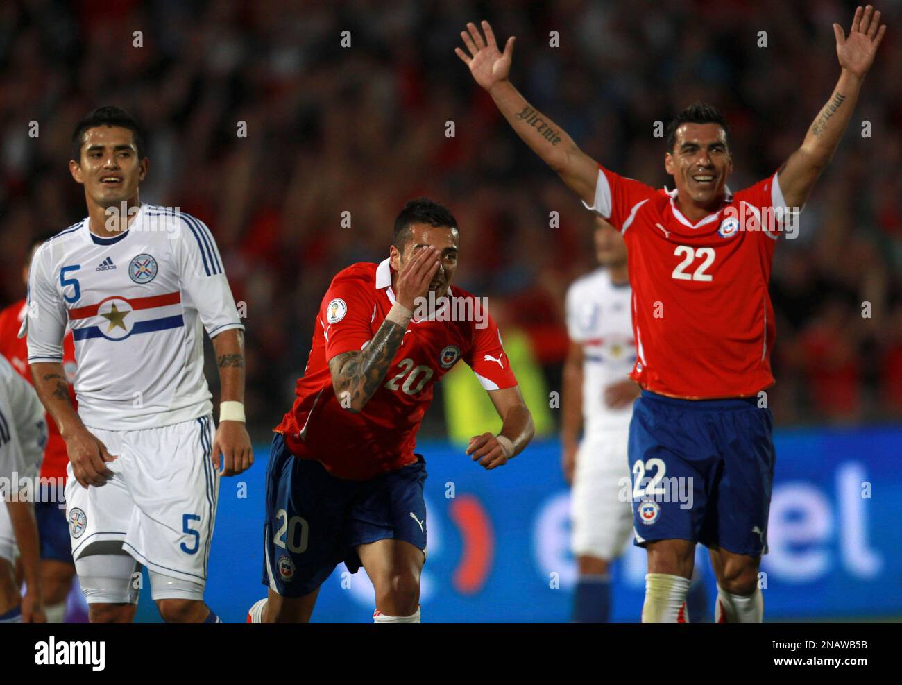 Chile's Matias Campos, center, celebrates his goal against Paraguay as ...