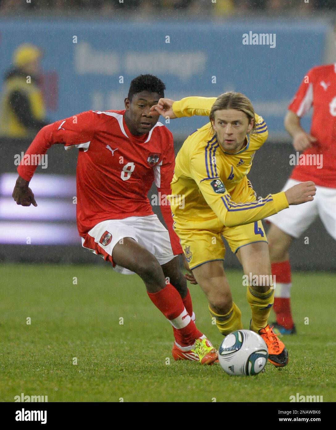 Ukraine's Anatoliy Tymoshchuk, right, fights for the ball with Austria ...