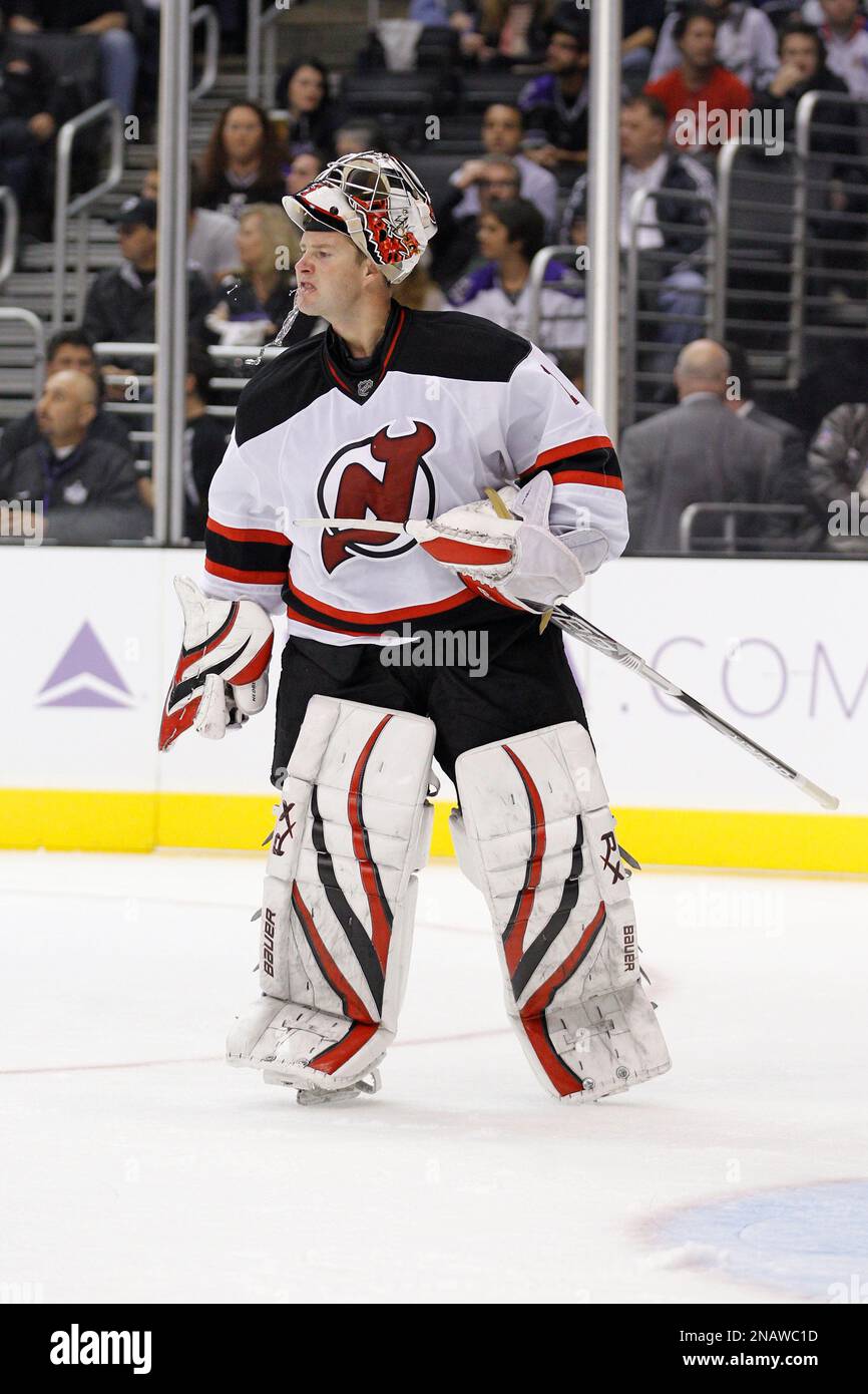 New Jersey Devils goalie Johan Hedberg spits during the second period ...