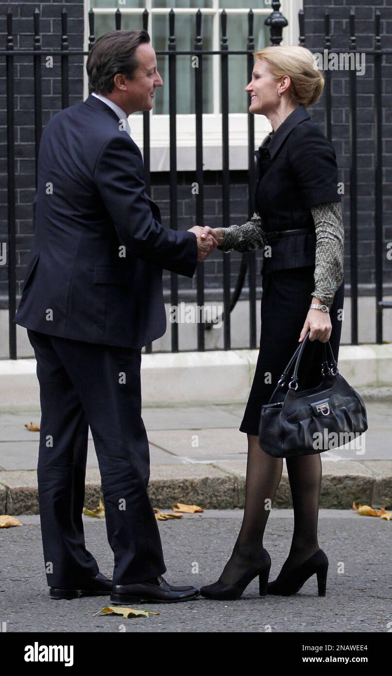Danish Prime Minister Helle Thorning-Schmidt, right, is greeted by ...