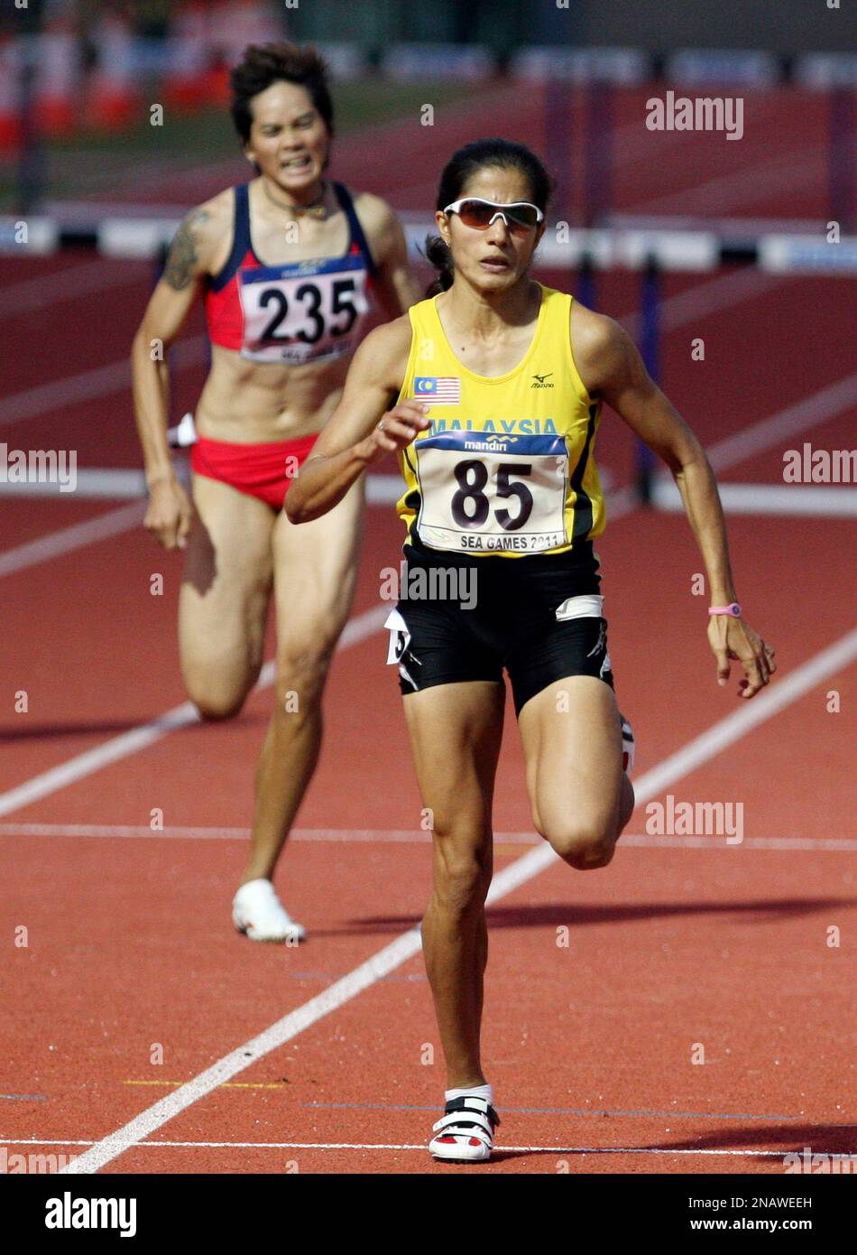 Malaysia's Noraseela Mohd Khalid run in the women's 400 meter hurdles final at the 26th ...