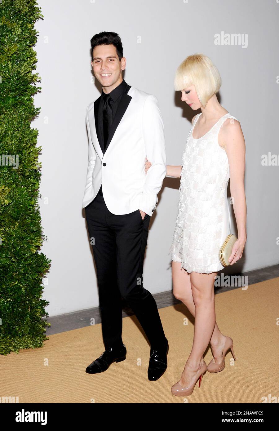 Singer Gabe Saporta, left, and fashion designer Erin Fetherston attend ...