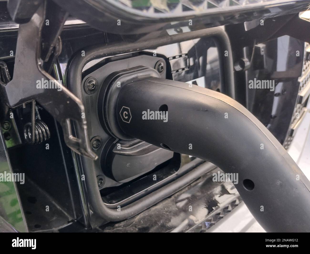 The power supply plug that is connected to the electric vehicle Stock ...