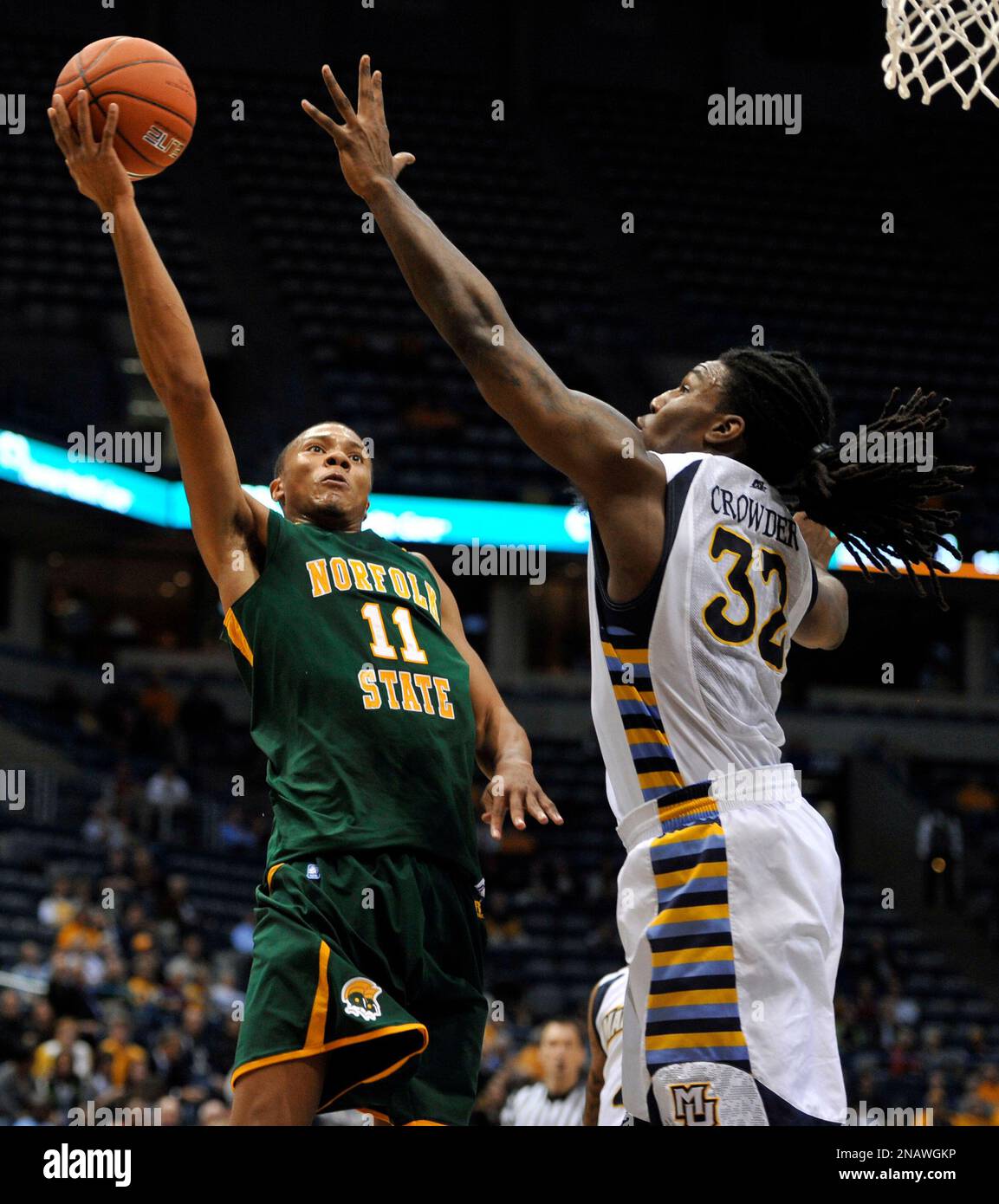 Norfolk State's Pendarvis Williams (11) drives to the basket around ...