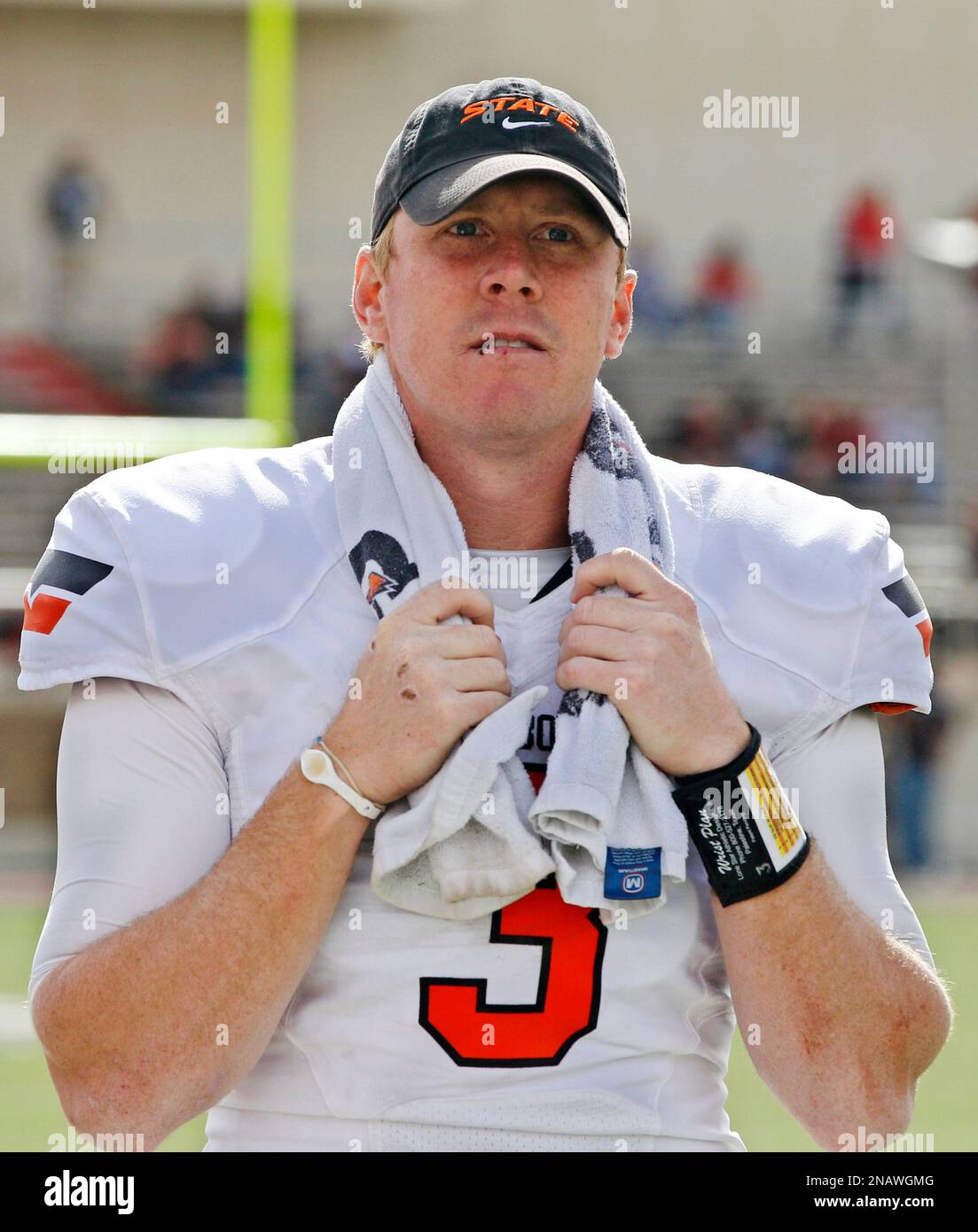 Oklahoma State quarterback Brandon Weeden is pictured on the sidelines ...