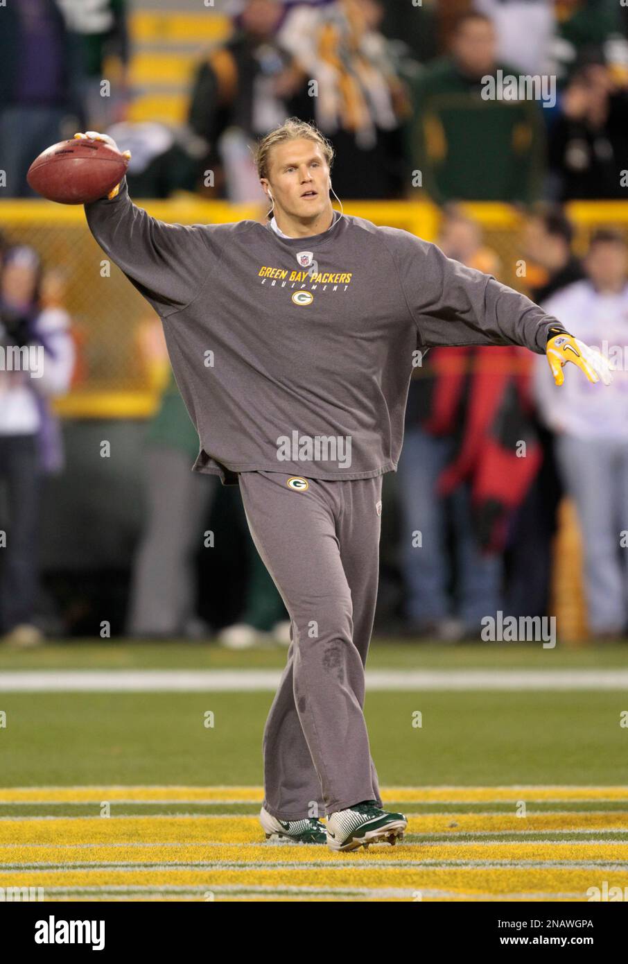 Green Bay Packers' Clay Matthews throws a ball before an NFL football game against the Minnesota ...