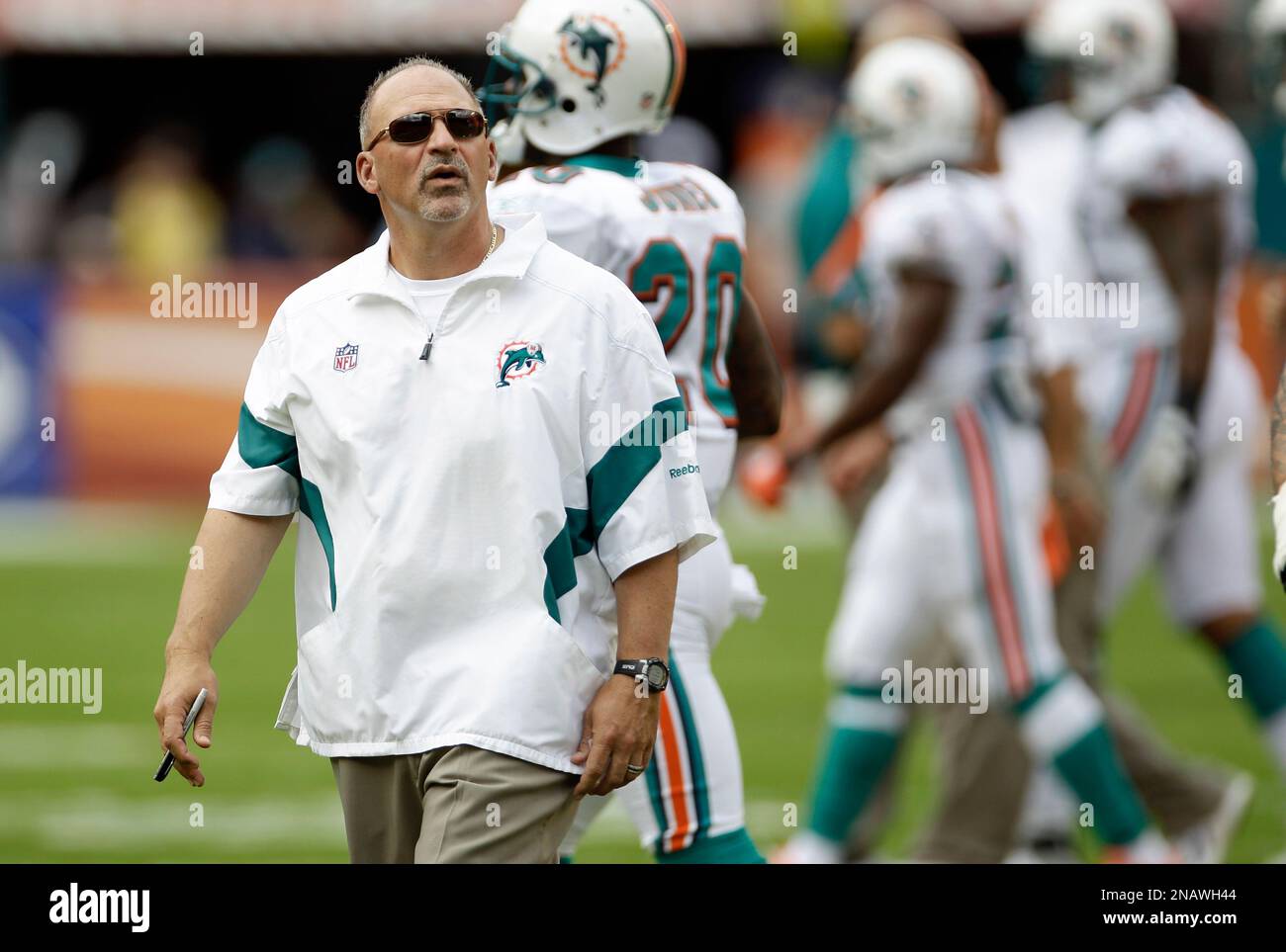 Miami Dolphins head coach Tony Sparano is shown on the field for warm ...