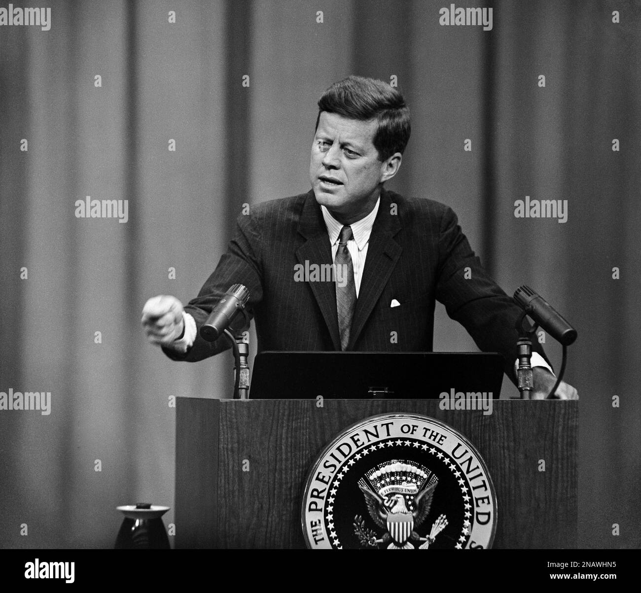 President John F. Kennedy answers a question during his news conference ...