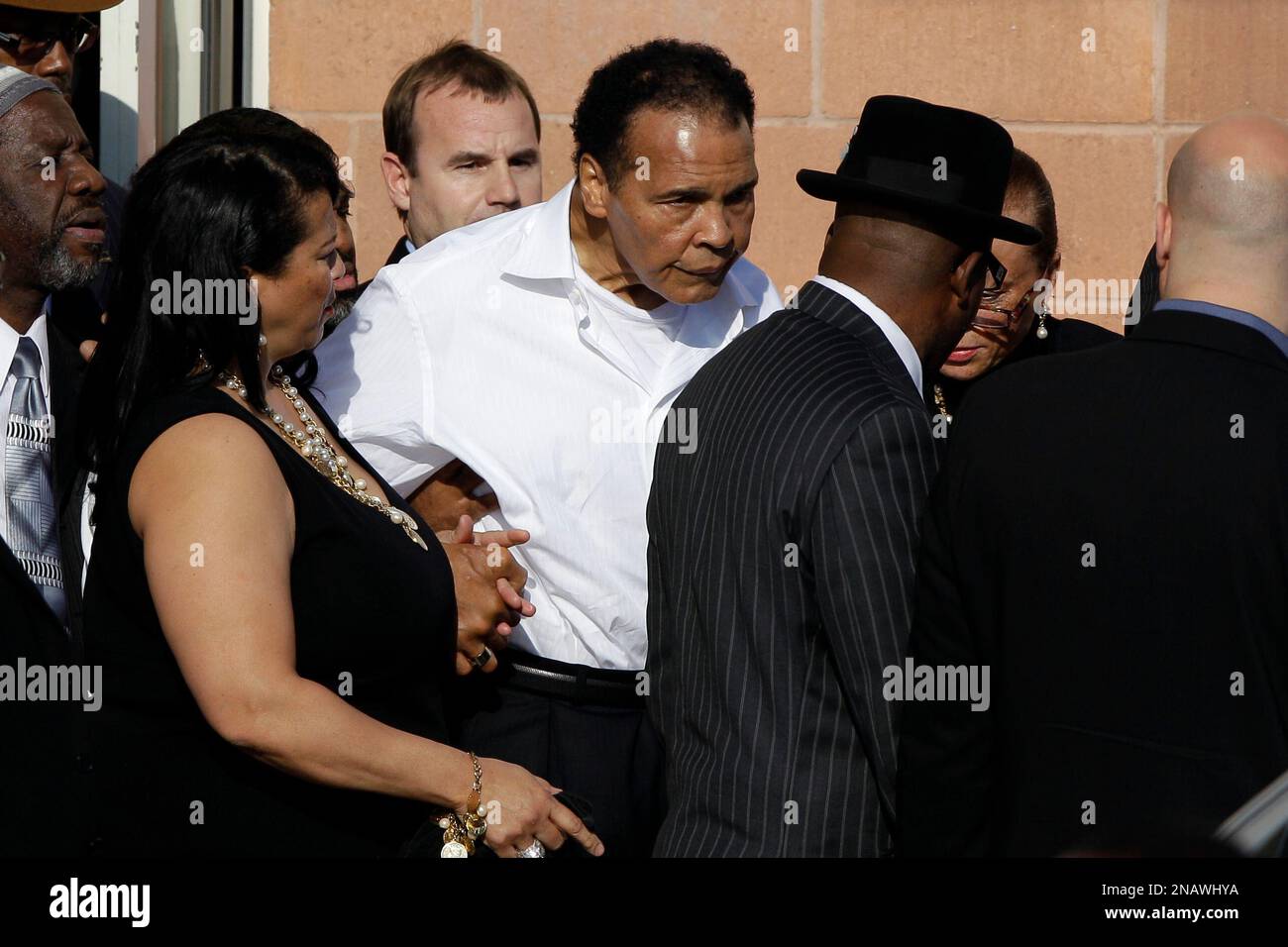 Former boxing champion Muhammad Ali leaves after a memorial service for ...