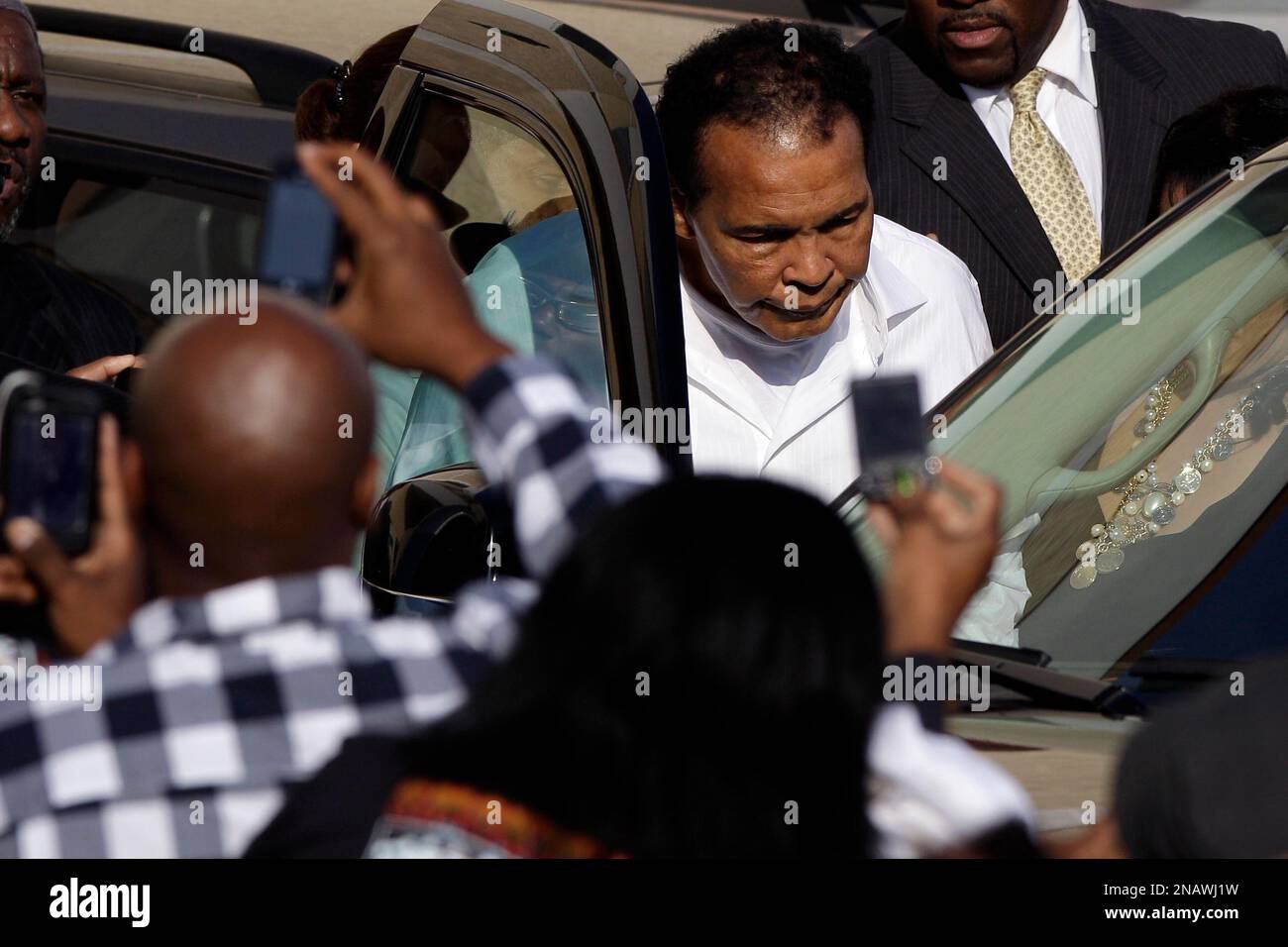 Former boxing champion Muhammad Ali leaves after a memorial service for ...