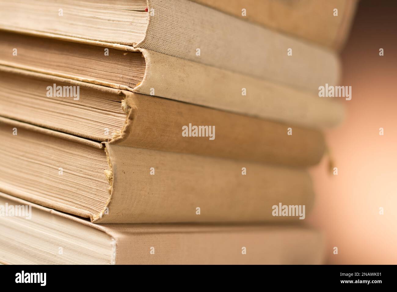 Many stacks of educational books at home preparing for exams on a white ...