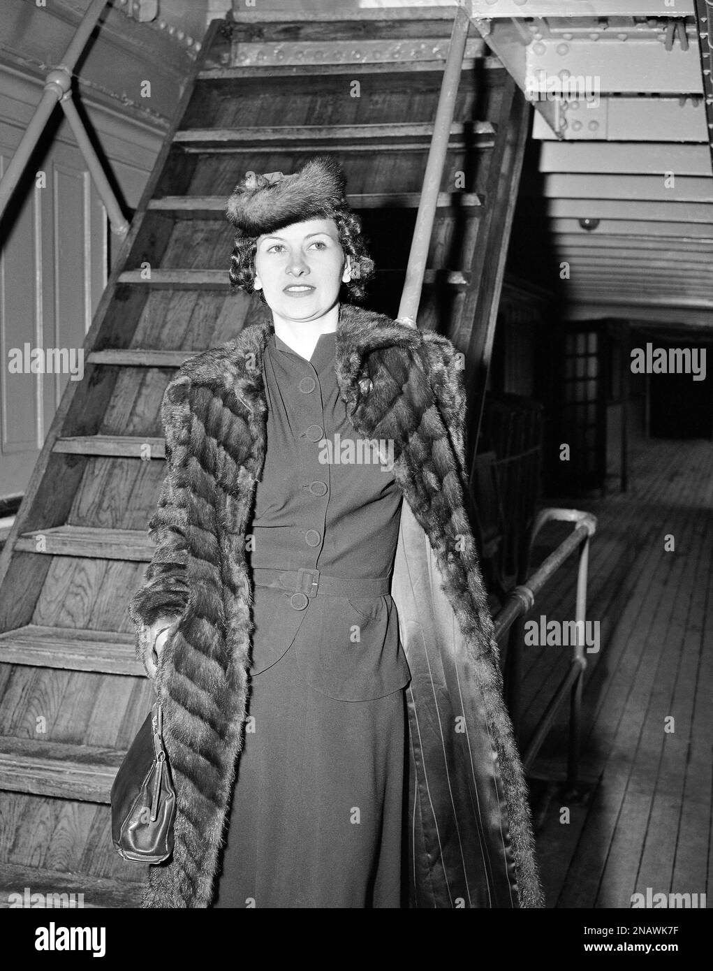 Mrs. Daniel Deluce, wife of an Associated Press war correspondent in ...
