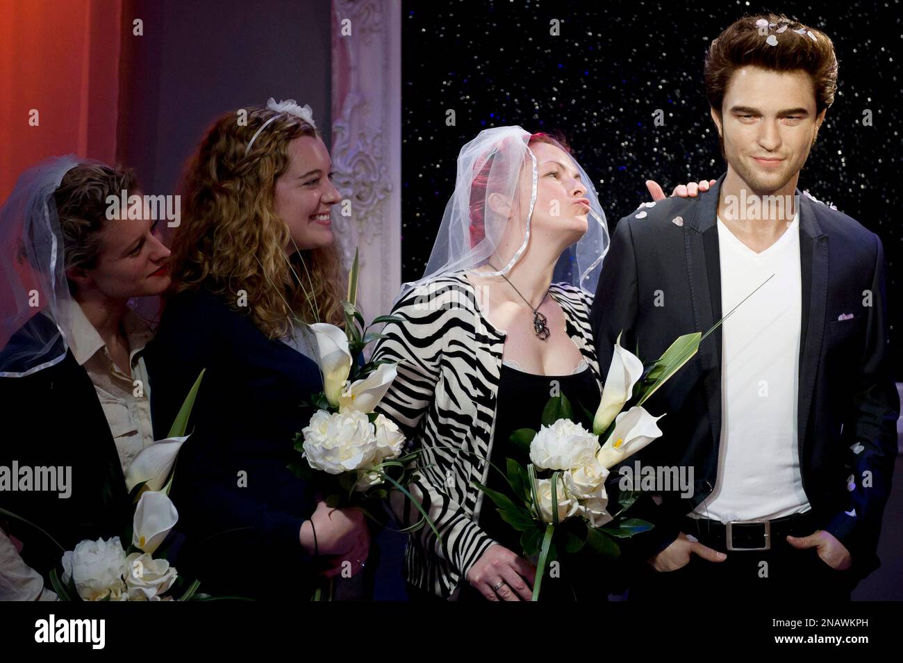 The waxwork of British actor Robert Pattinson, right, at Madame ...
