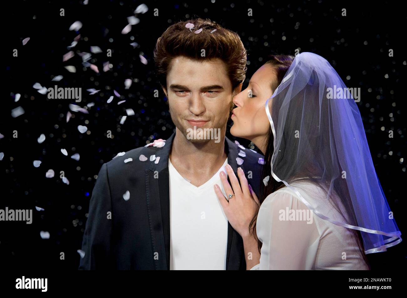 The waxwork of British actor Robert Pattinson, left, at Madame Tussauds ...