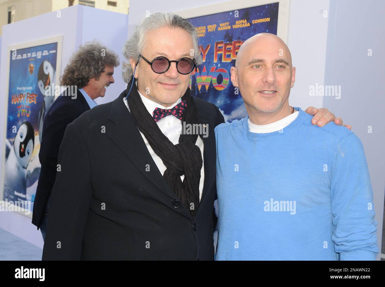 George Miller, at left, and Jeff Robinov arrives at the premiere of ...
