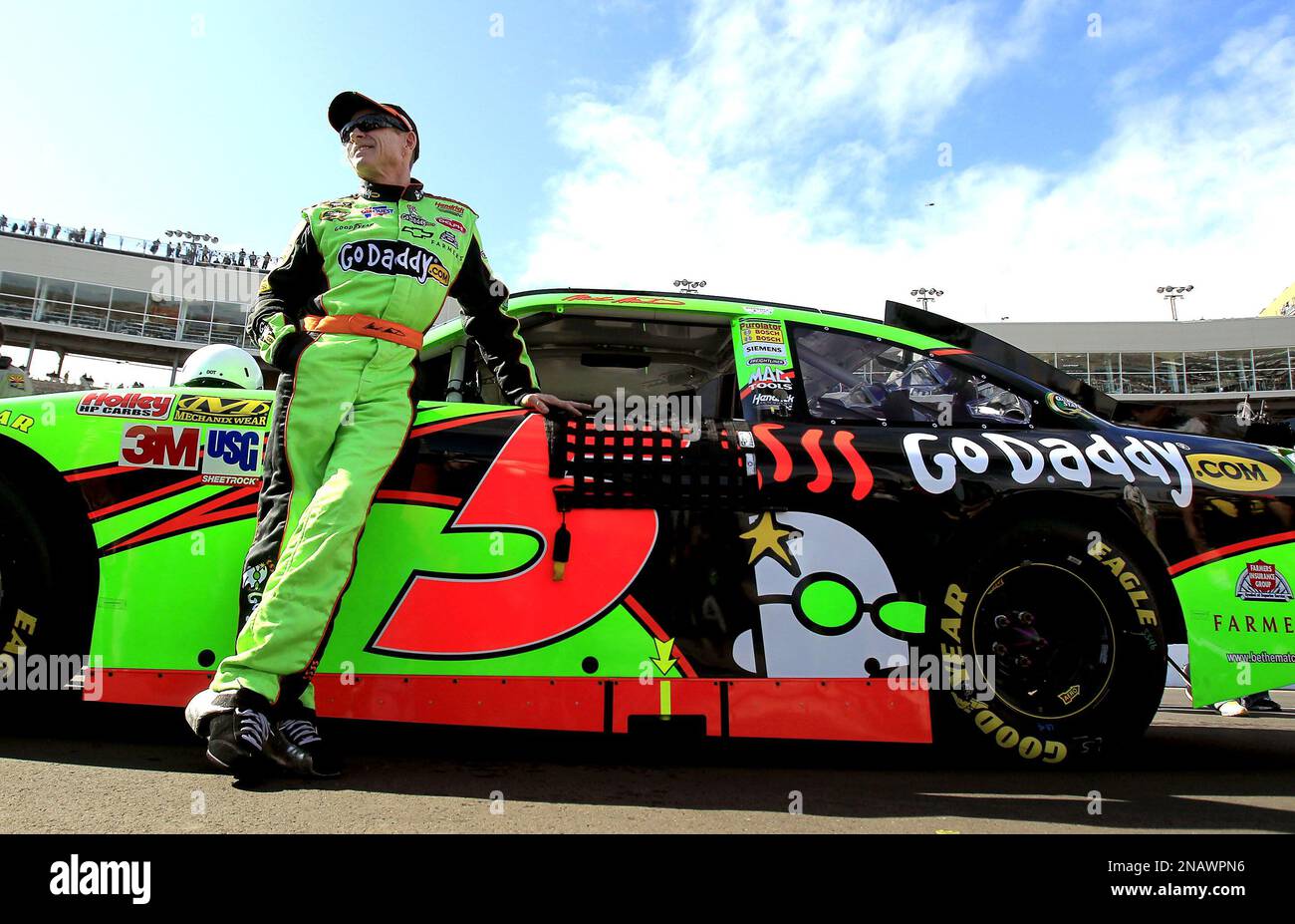 Mark Martin leans on his car in pit row prior to the NASCAR Sprint Cup ...